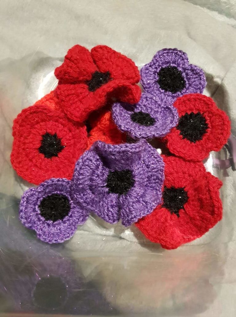 Knitting poppies - Bridging Arts